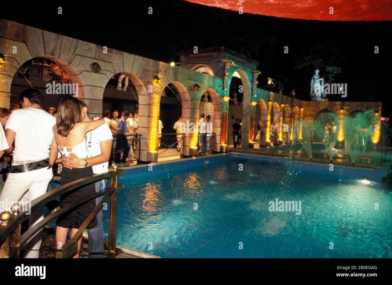 People at the pool of the Baia Imperiale Disco at night, Cattolica ...