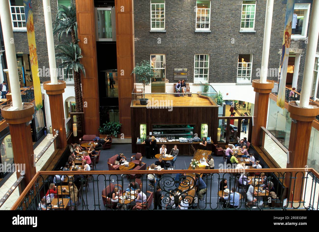 People at the terrace of a cafe at a courtyard, Powers Court Townhouse ...