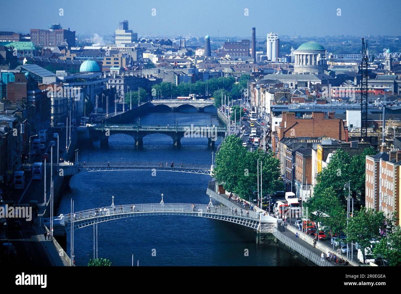 View of the Halfpenny Bridge and the river Liffey, Dublin, Ireland ...
