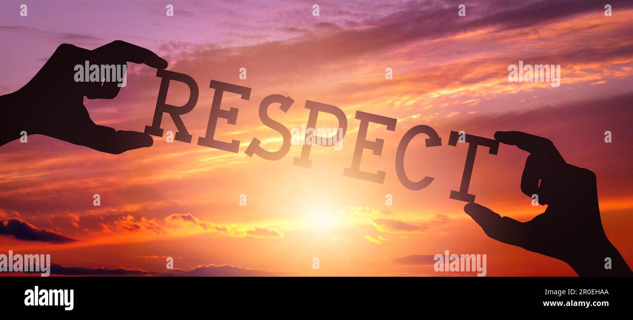 Respect - human hands holding black silhouette word Stock Photo - Alamy