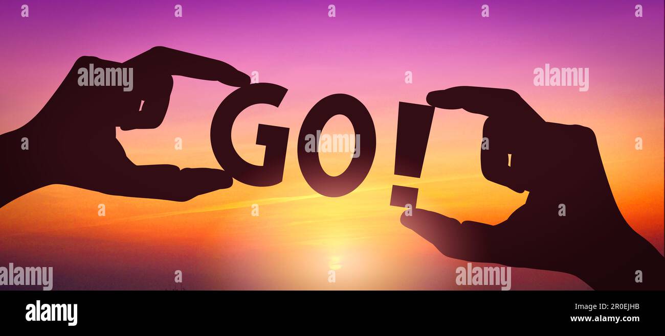 Go - human hands holding black silhouette word Stock Photo - Alamy