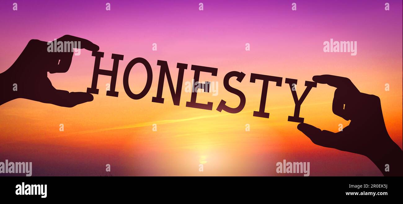 Honesty - human hands holding black silhouette word Stock Photo - Alamy