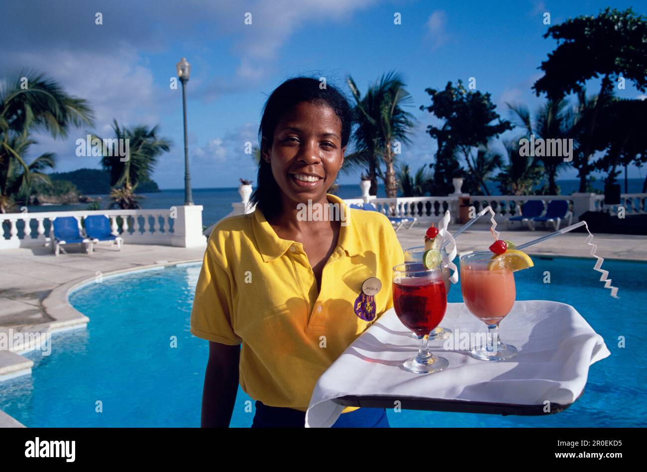 Caribbean cocktail waitress hi-res stock photography and images - Alamy