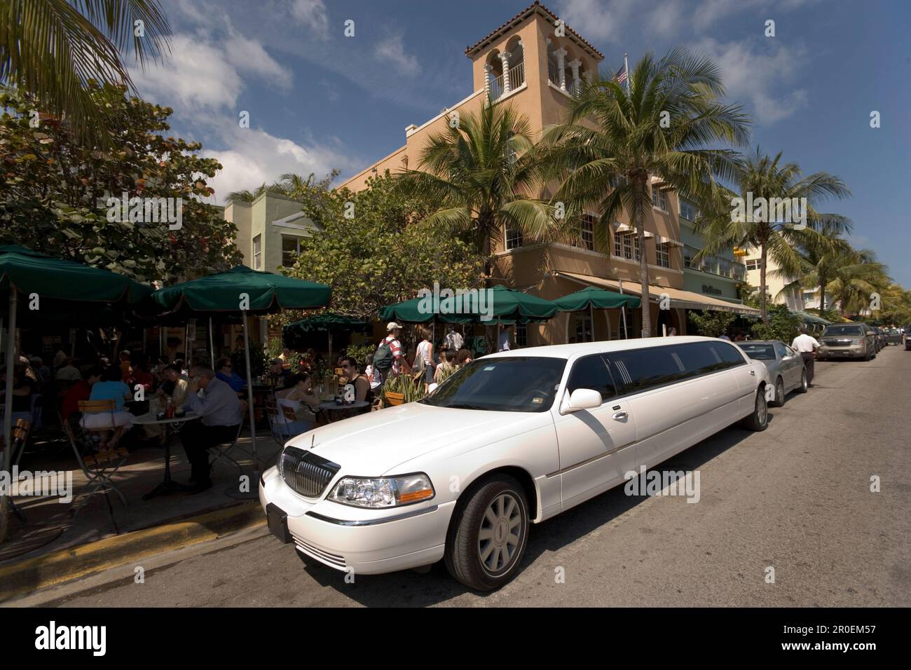 Stretched limousine is passing on Ocean Drive, South Beach, Miami ...