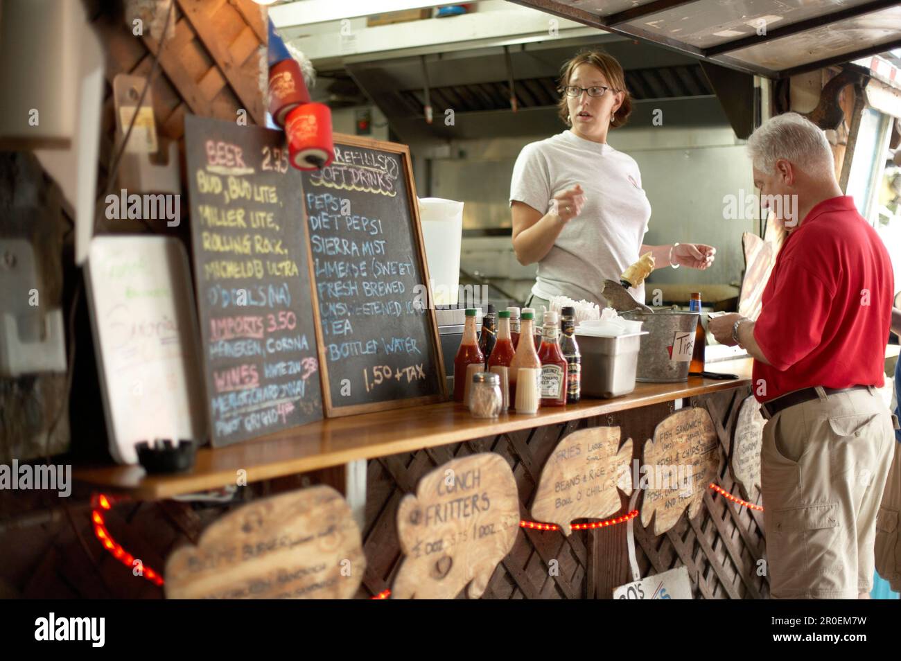 A hungry customer in front of BO's fishwagon, Conch Republic, Key West ...