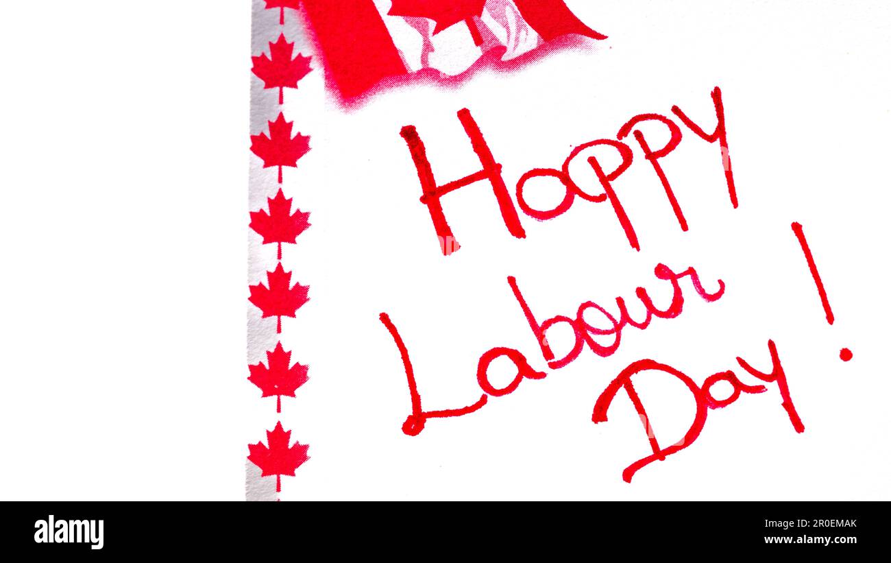 Happy labour day handwriting on paper with Canada flag. Writing text on ...