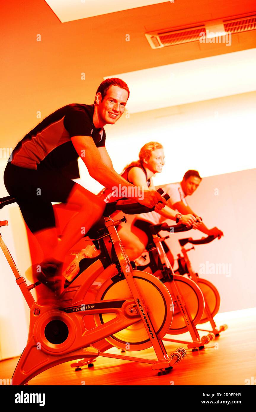 Spinning, Men and woman in gym on exercise bikes, Spinning, leos Sports ...