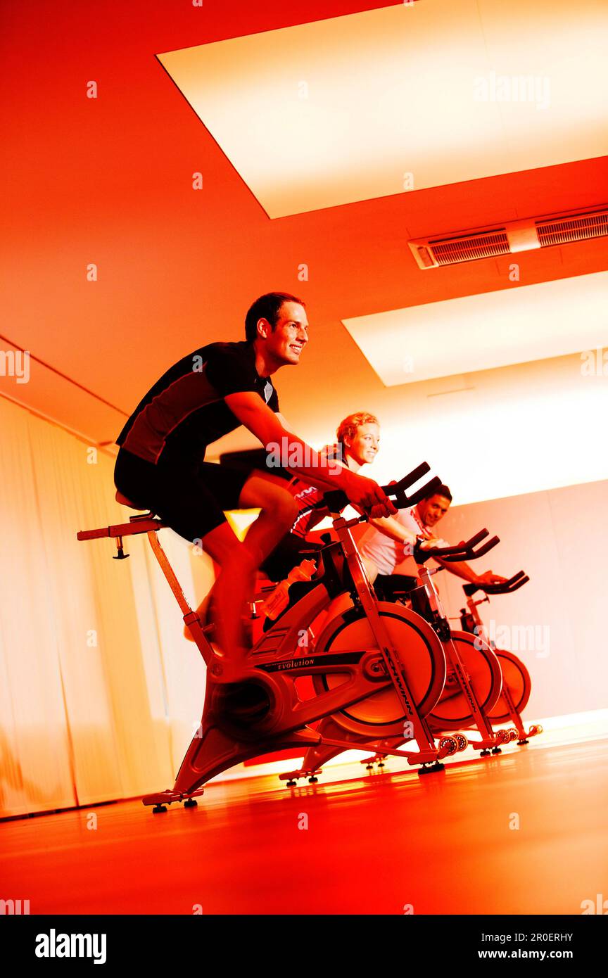 Spinning, Men and woman in gym on exercise bikes, Spinning, leos Sports ...