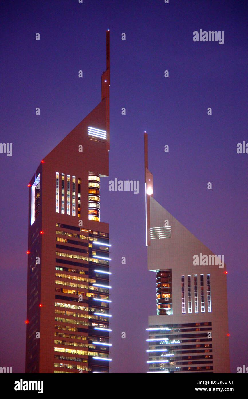 Emirates Towers, modern high rise buildings in the evening, Dubai, UAE ...
