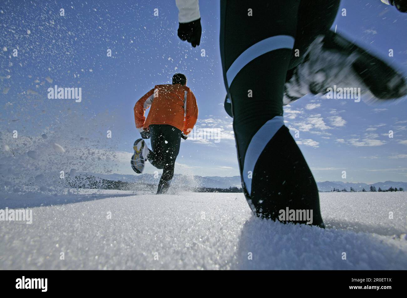Woman walking through deep snow hi-res stock photography and images - Alamy