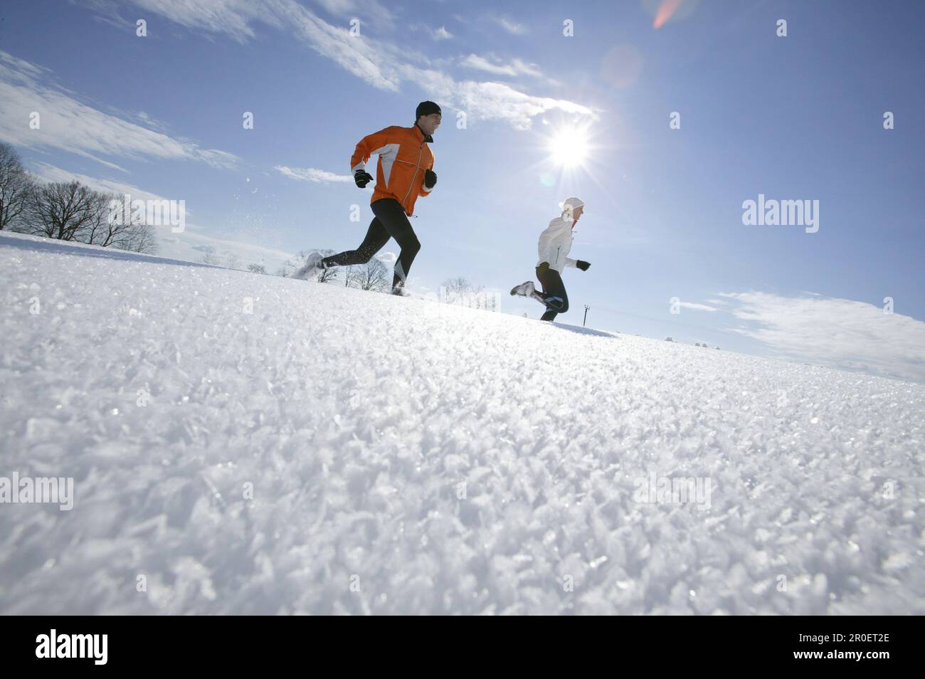 Old man walking through snow hi-res stock photography and images - Alamy