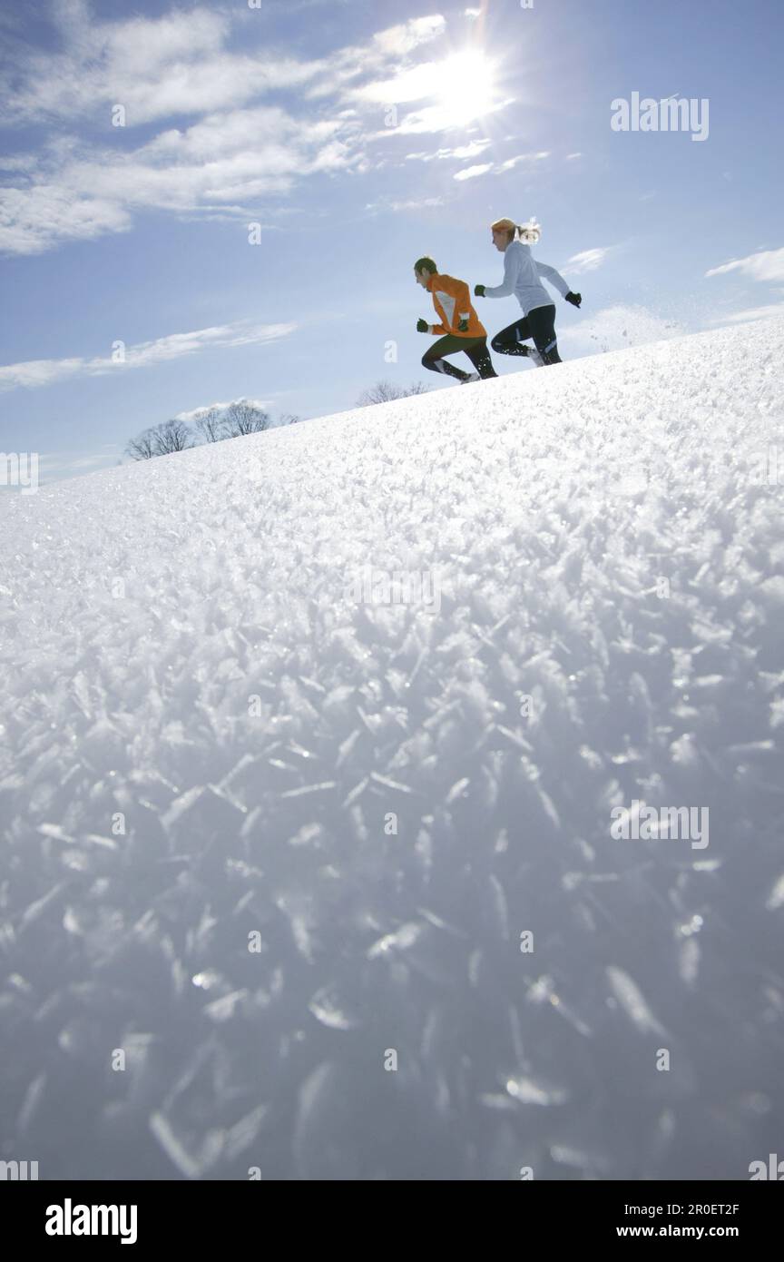 Old man walking through snow hi-res stock photography and images - Alamy