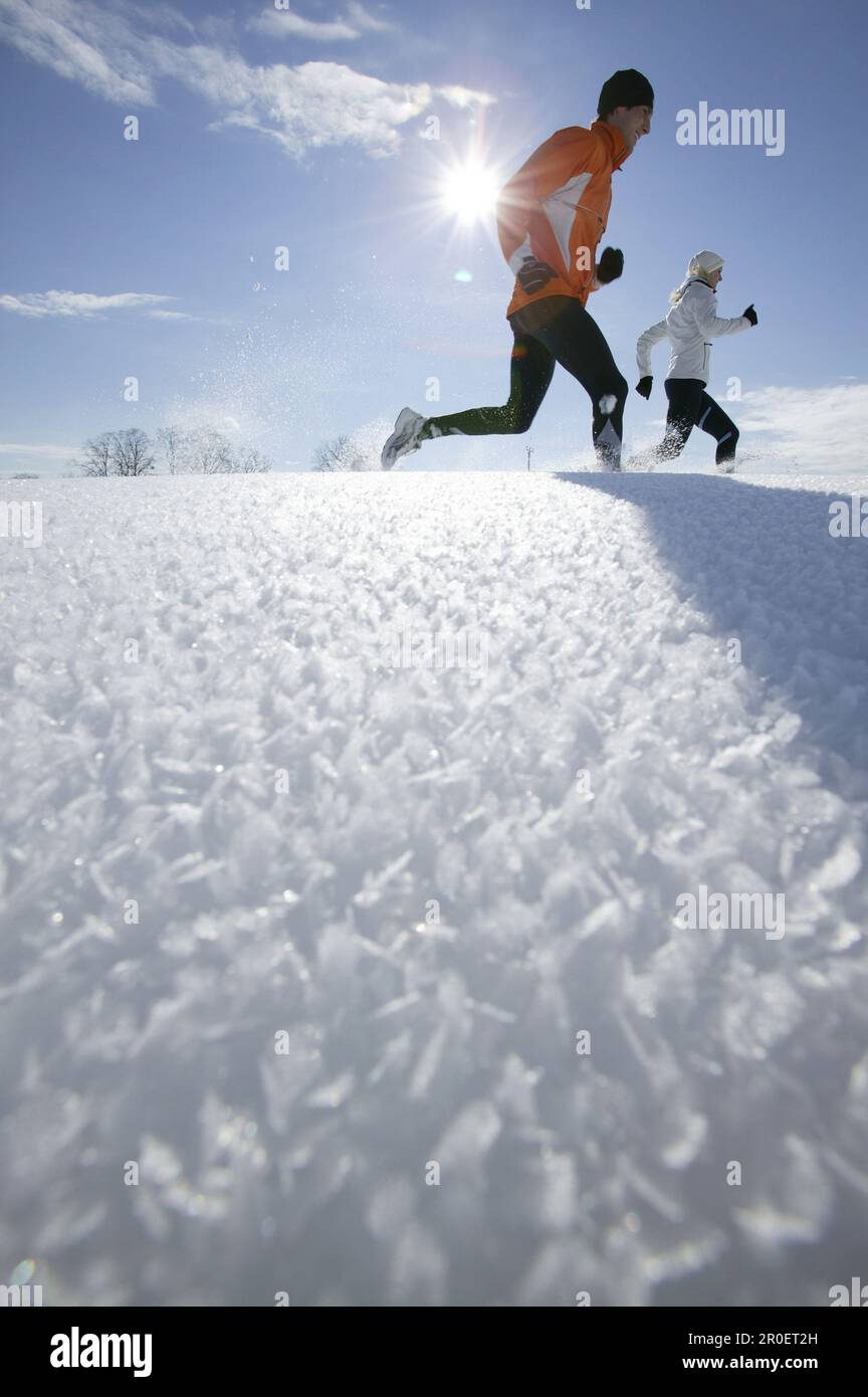 Old man walking through snow hi-res stock photography and images - Alamy