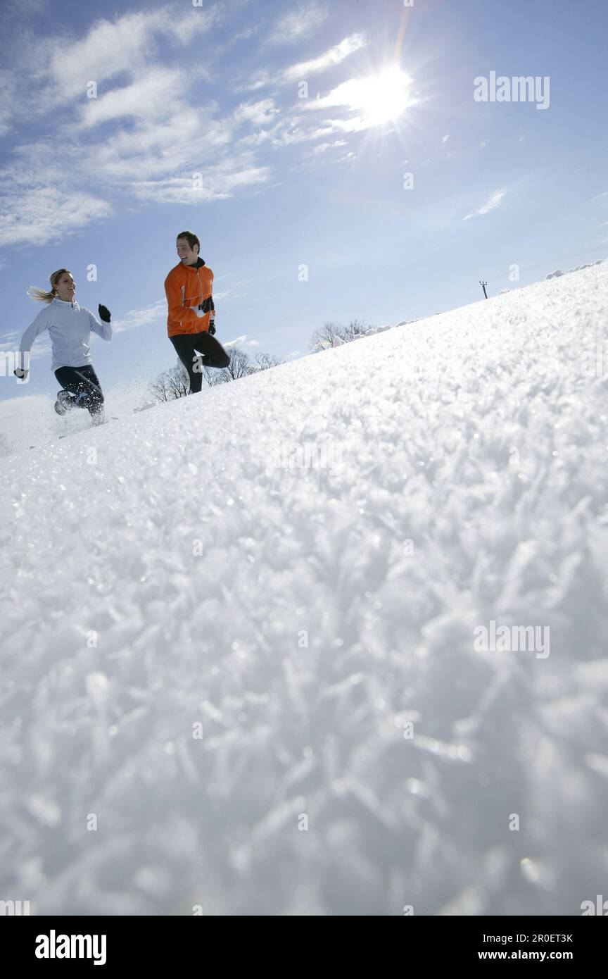 Old man walking through snow hi-res stock photography and images - Alamy