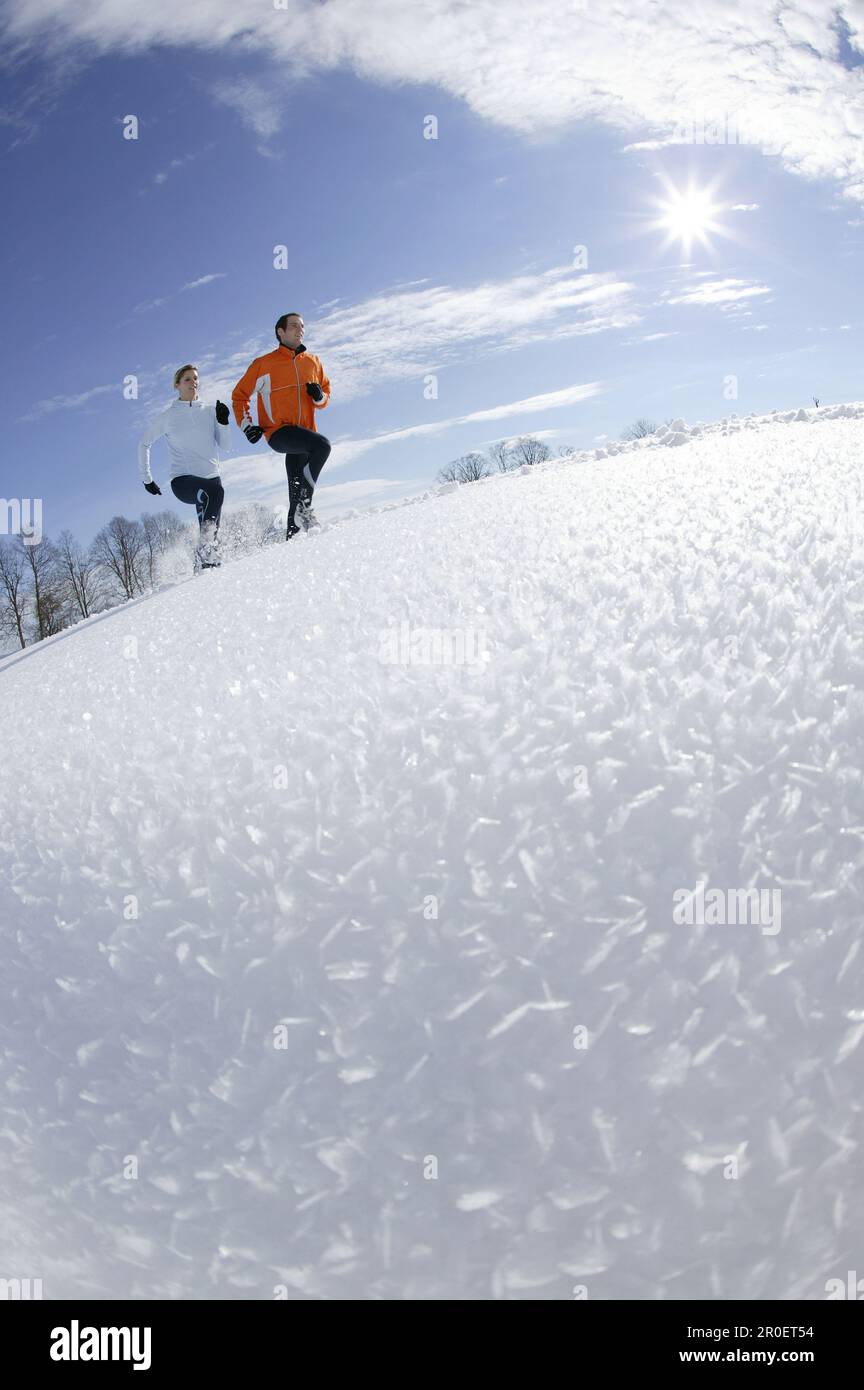 Old man walking through snow hi-res stock photography and images - Alamy