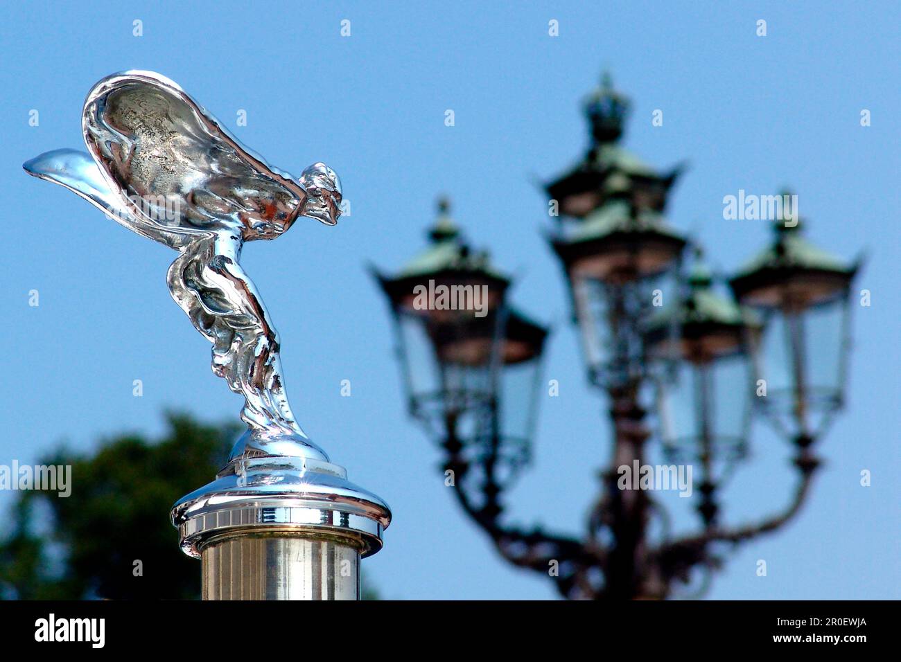 Hood ornament of a Rolls Royce Emily and street lamp, Baden-Baden ...