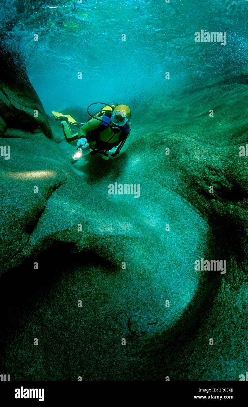 Scuba diving in a freshwater river, Switzerland, Tessin, Verzasca ...