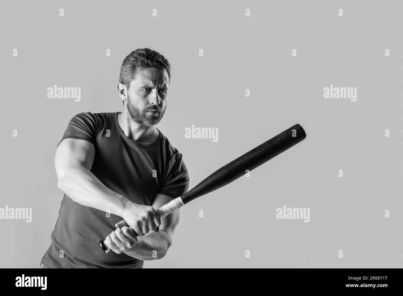 photo of angry man hold bat. angry man threatening with baseball bat ...