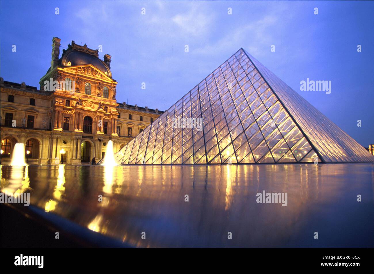 Glass pyramid and Louvre in the evening, Paris, France, Europe Stock ...