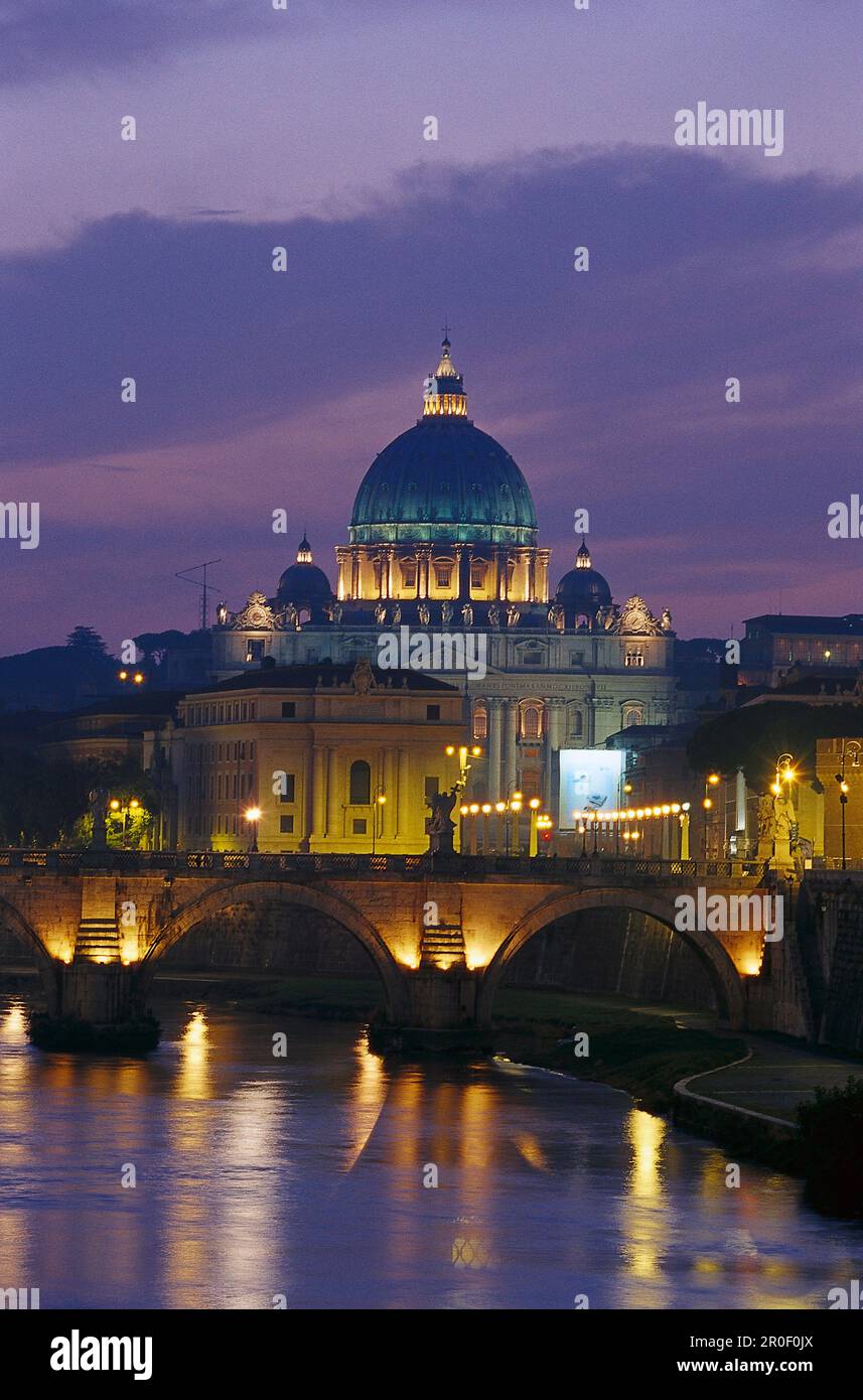 Castel Sant Angelo, bridge Sant Angelo and St. Peter's basilica in the evening, Rome, Italy ...