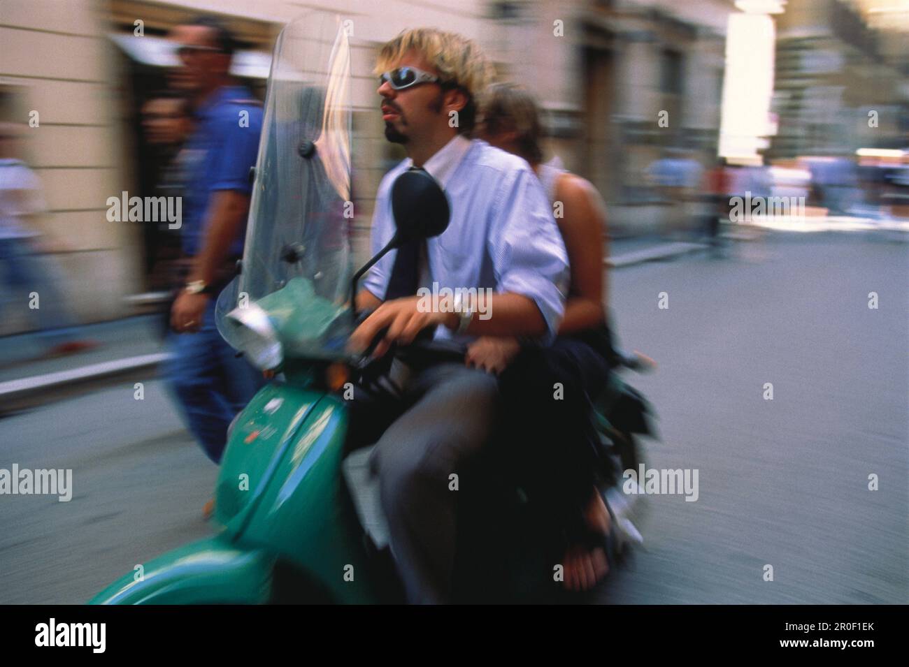Man on scooter in rome hi-res stock photography and images - Alamy