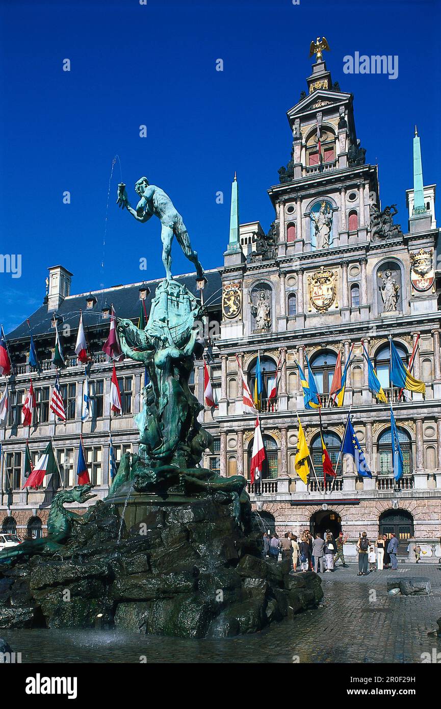 Town hall and Brabo fountain under blue sky, Antwerp, Flanders, Belgium ...
