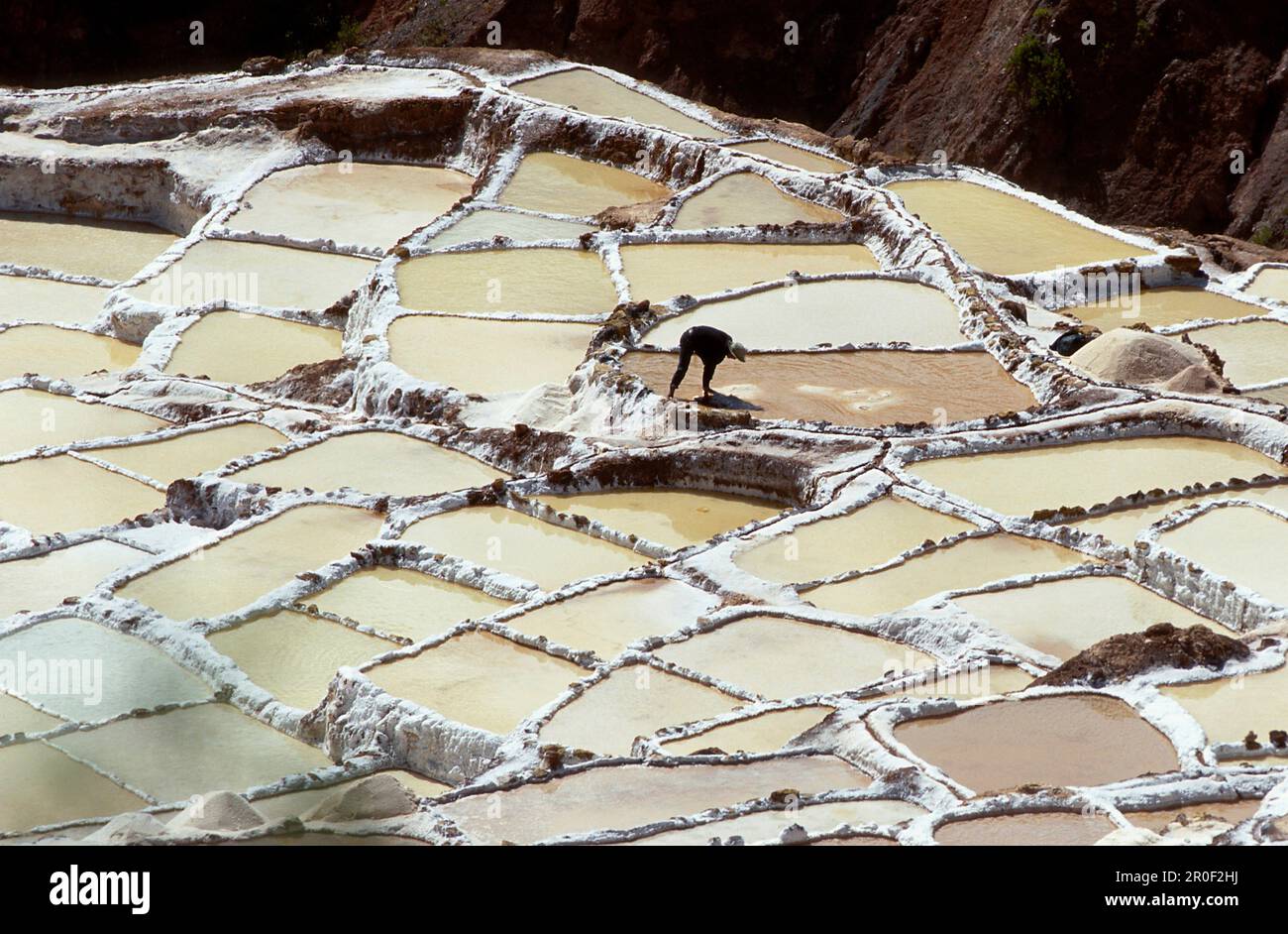 View at salt basin in the mountains, Maras, Peru, South America ...