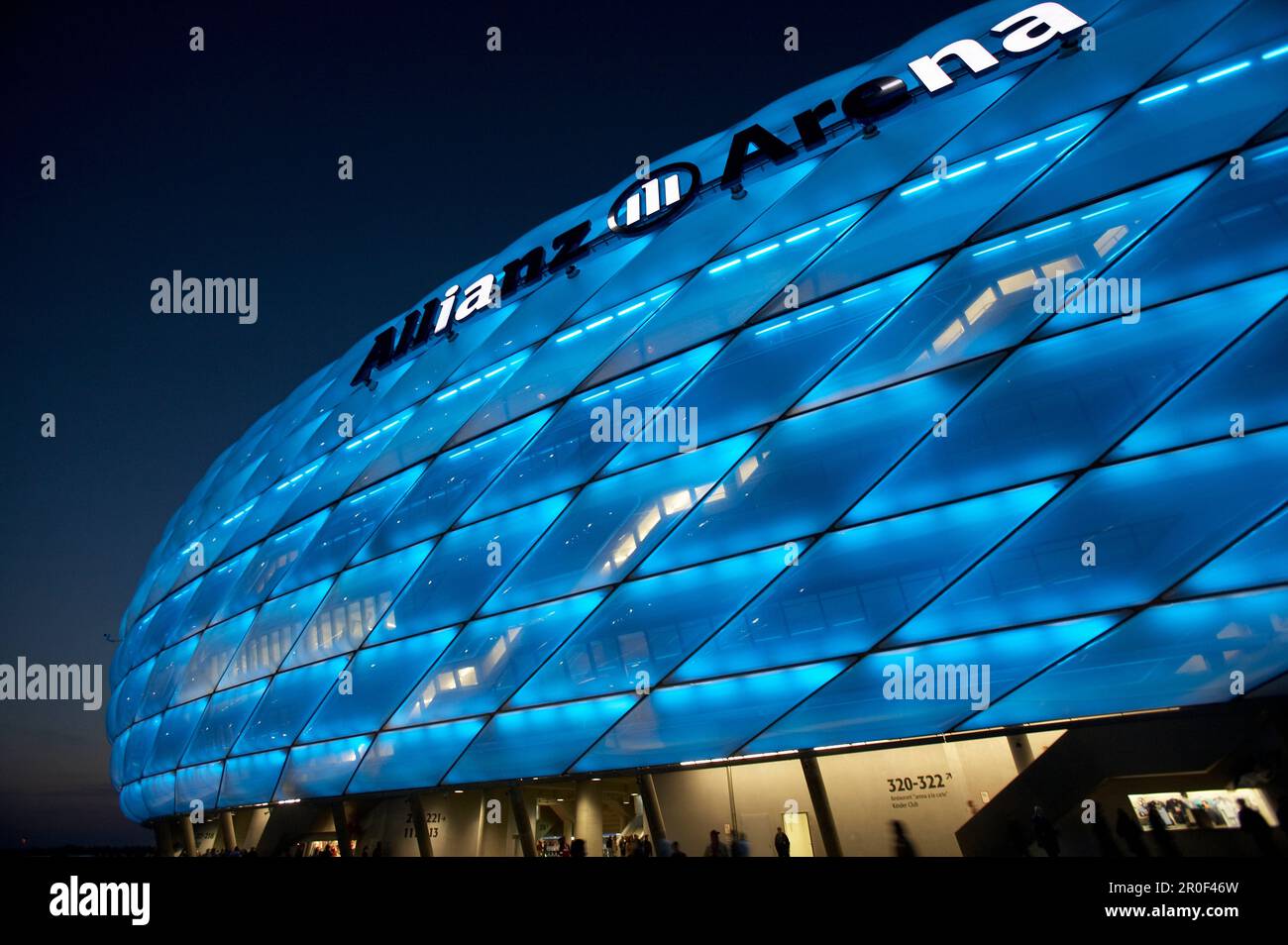 Colorful lit Allianz Arena football stadium at night, Munich, Bavaria ...