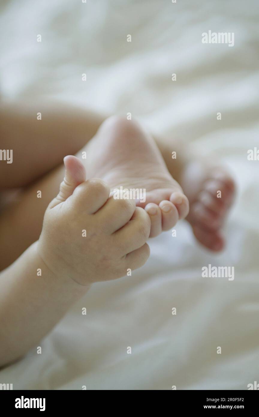 Holding someone up with feet hi-res stock photography and images - Alamy
