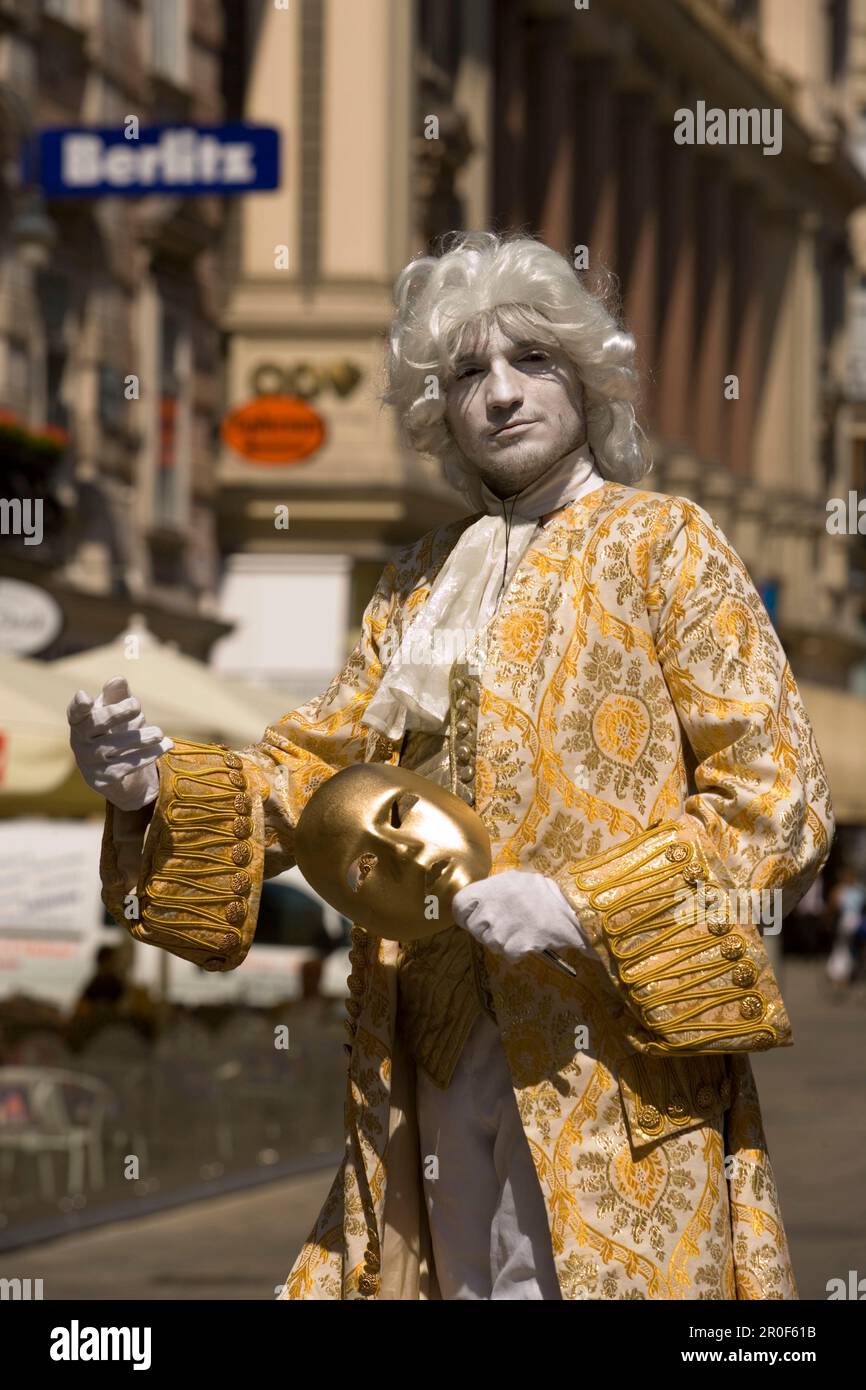 Street artist wearing fancy-dress costume like Mozart, Vienna, Austria ...