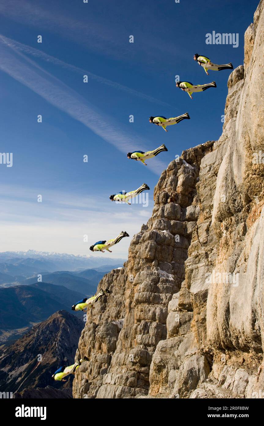 Base jumping from the rock face of Dachstein Mountain, Austria Stock ...