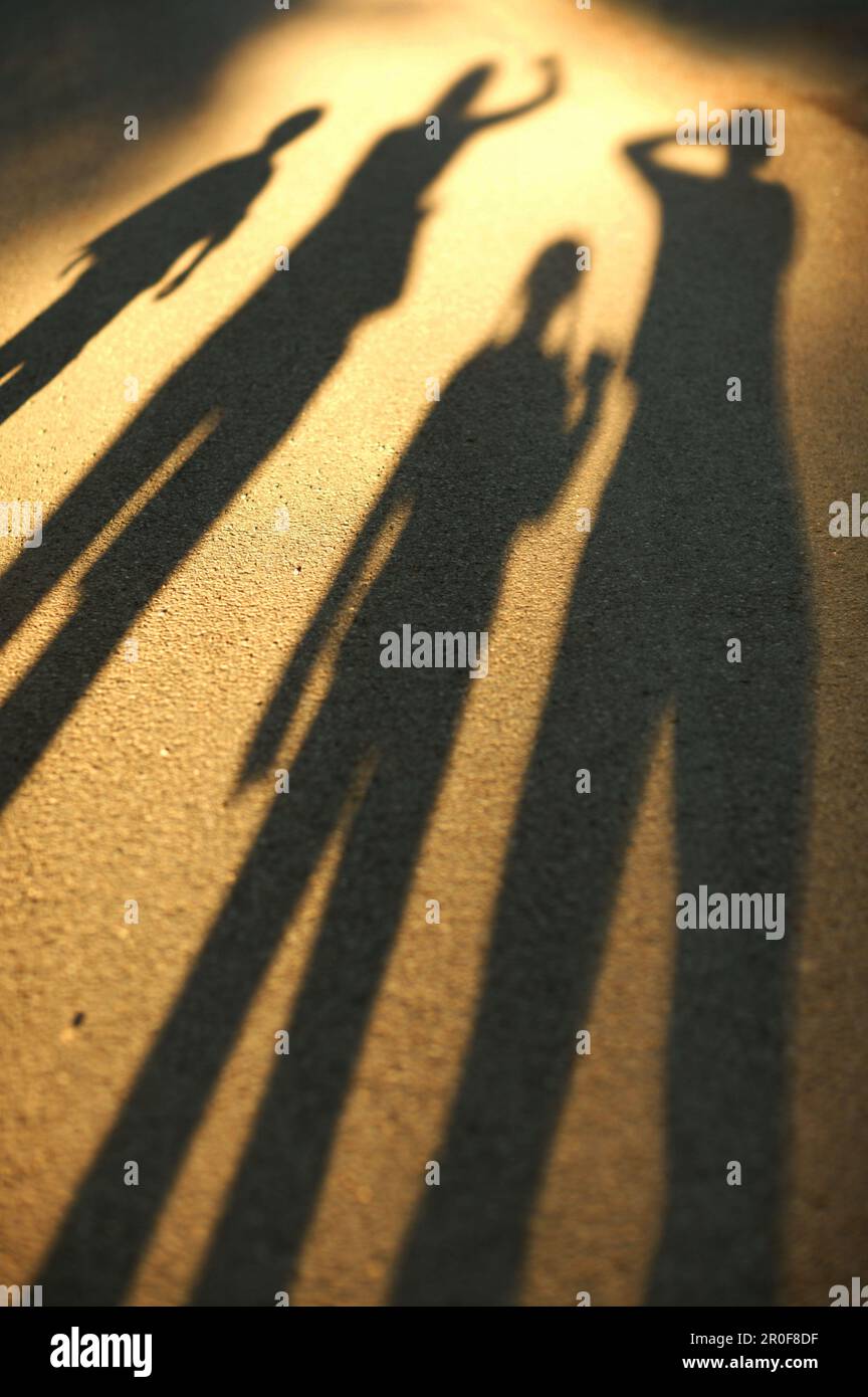 Human shadows on the ground hi-res stock photography and images - Alamy