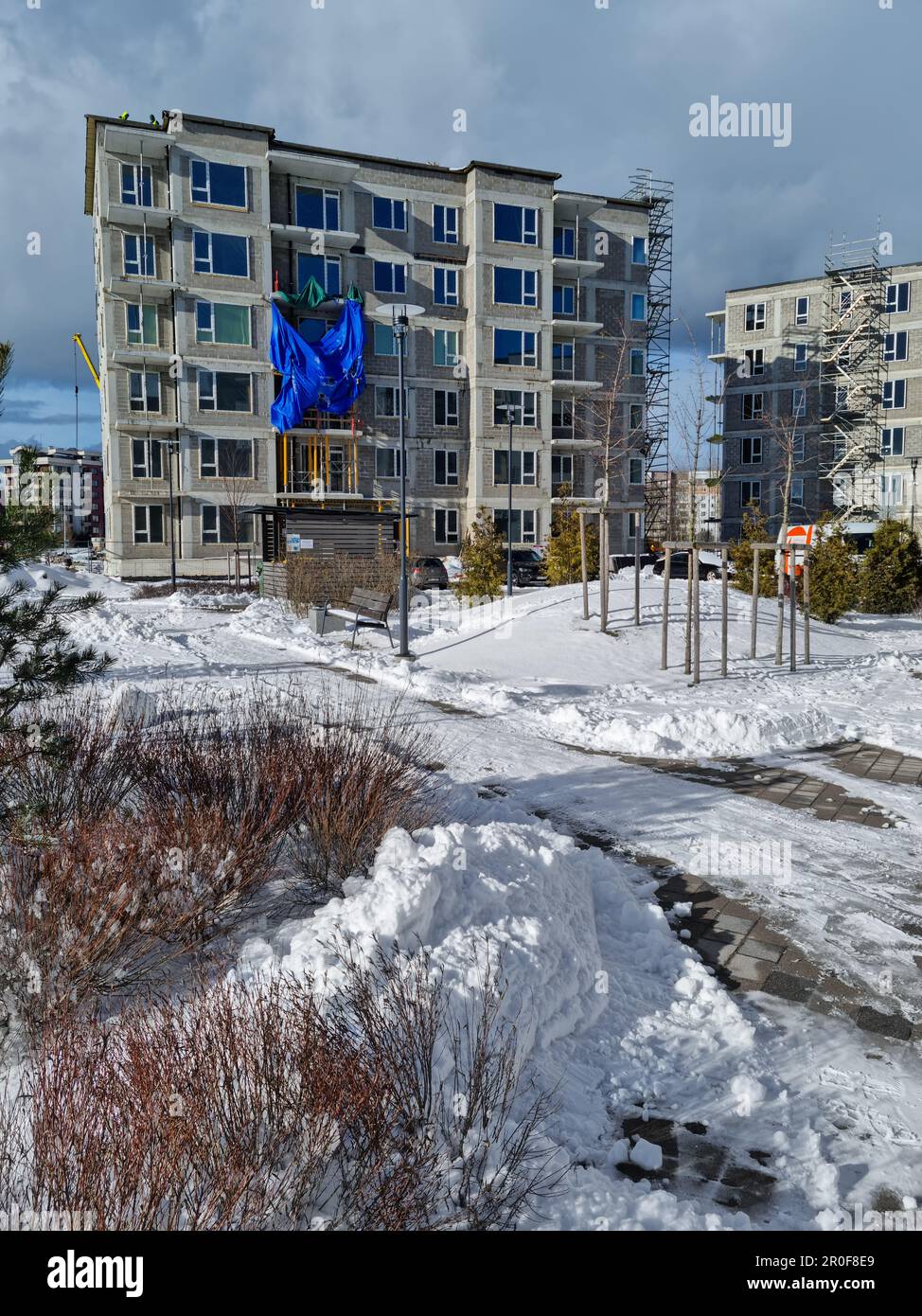 Modern apartment complex in a construction process. Multistorey ...