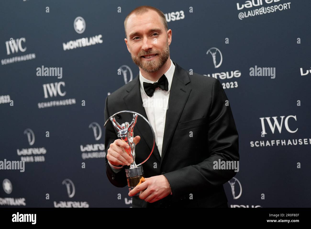 Danish soccer player Christian Eriksen poses after he was presented the ...