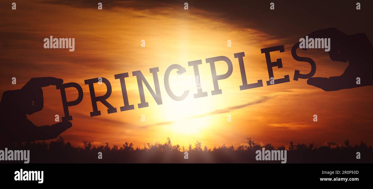 Principles - human hands holding black silhouette word Stock Photo - Alamy