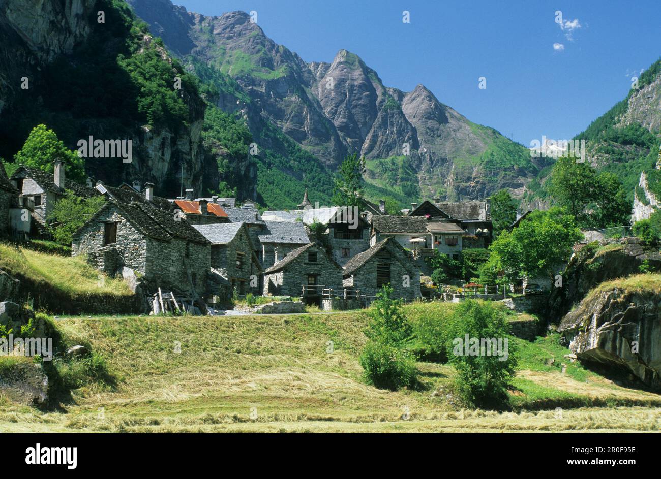 A typical village with traditional stone houses, Sonlerto, Ticino ...