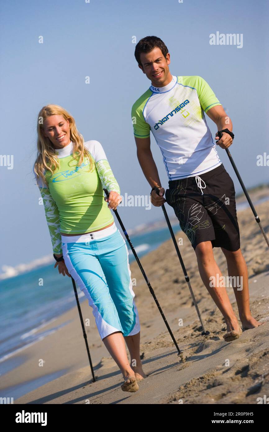 Holding long poles hi-res stock photography and images - Alamy