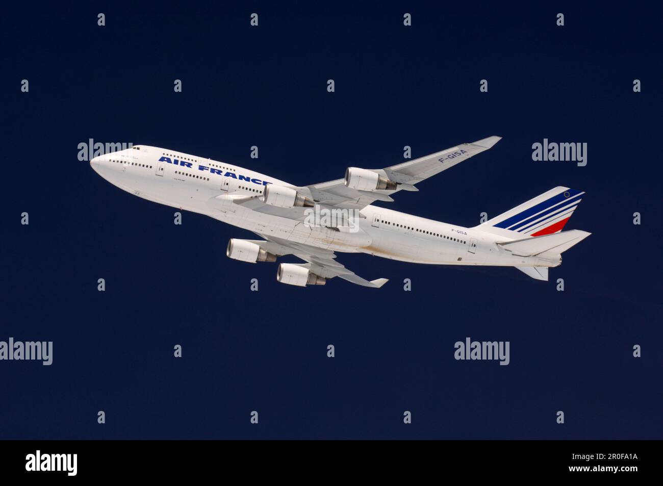 Boeing 747 Jumbo Jet in front of a dark blue sky Stock Photo - Alamy