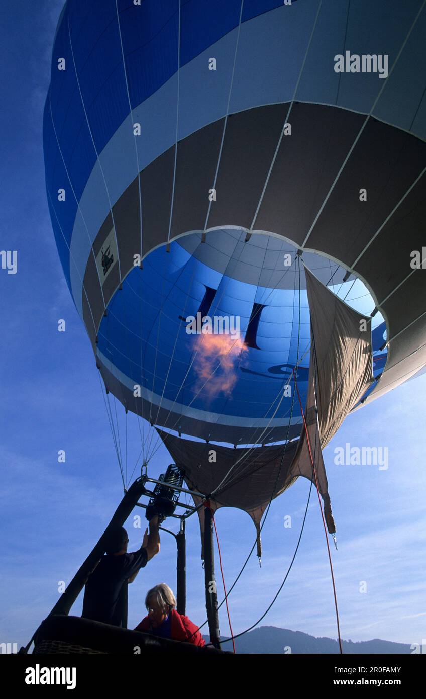 The take-off of a balloon flight showing the heating of the hot air ...