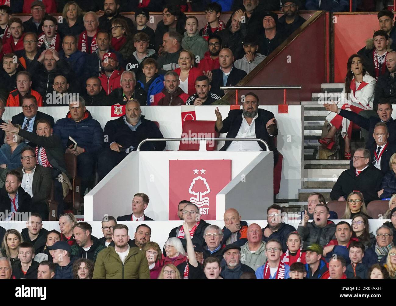 Nottingham Forest owner Evangelos Marinakis (centre right) reacts in ...