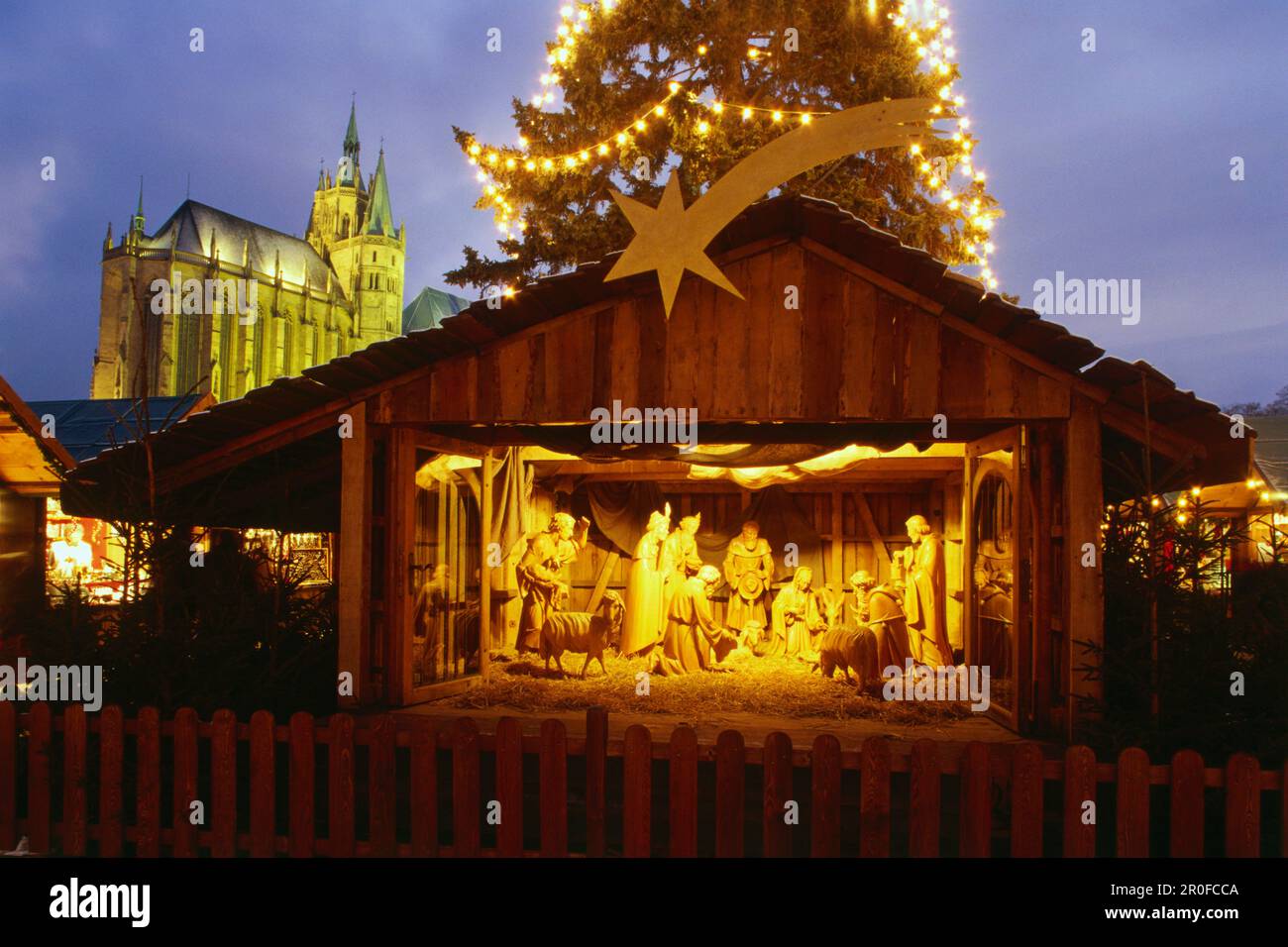 Nativity scene at Christmas market, cathedral square in the evening ...