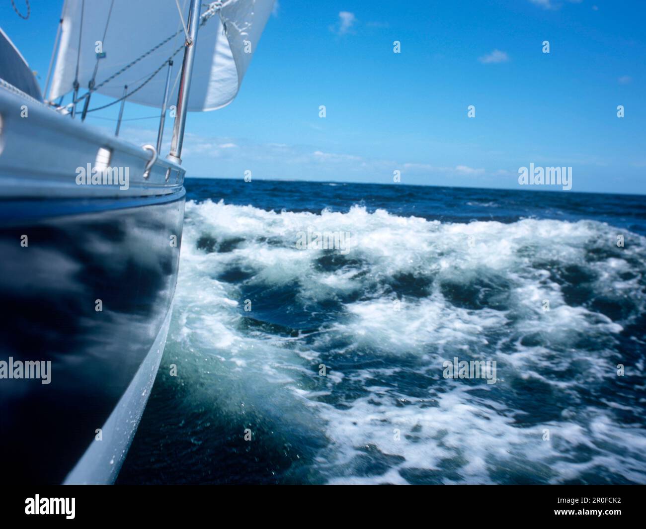 Sailboat cutting through water, Bay of Kiel between Germany and Denmark ...