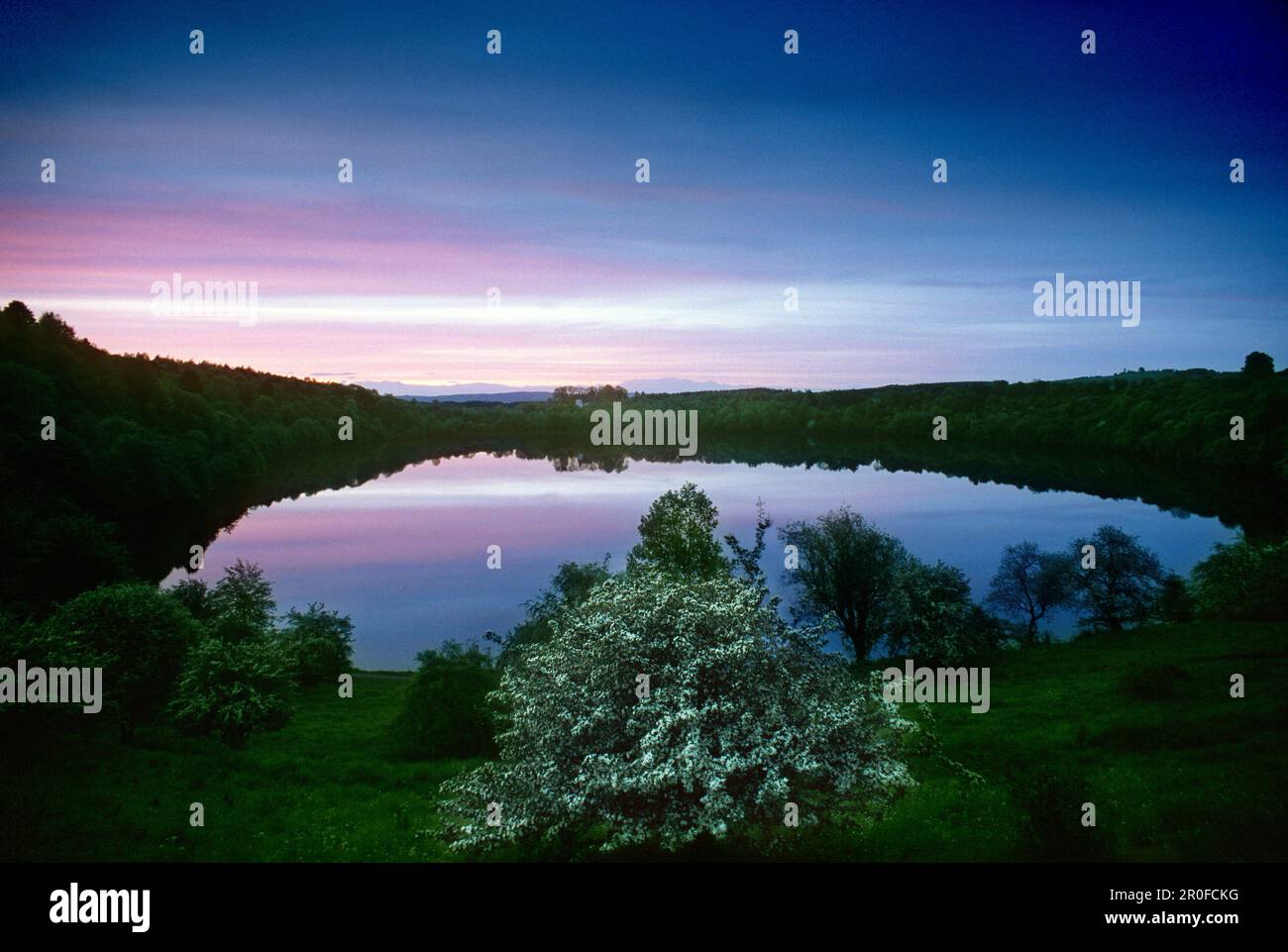 A landscape with lake formed by a volcanic explosion, Weinfelder Maar ...