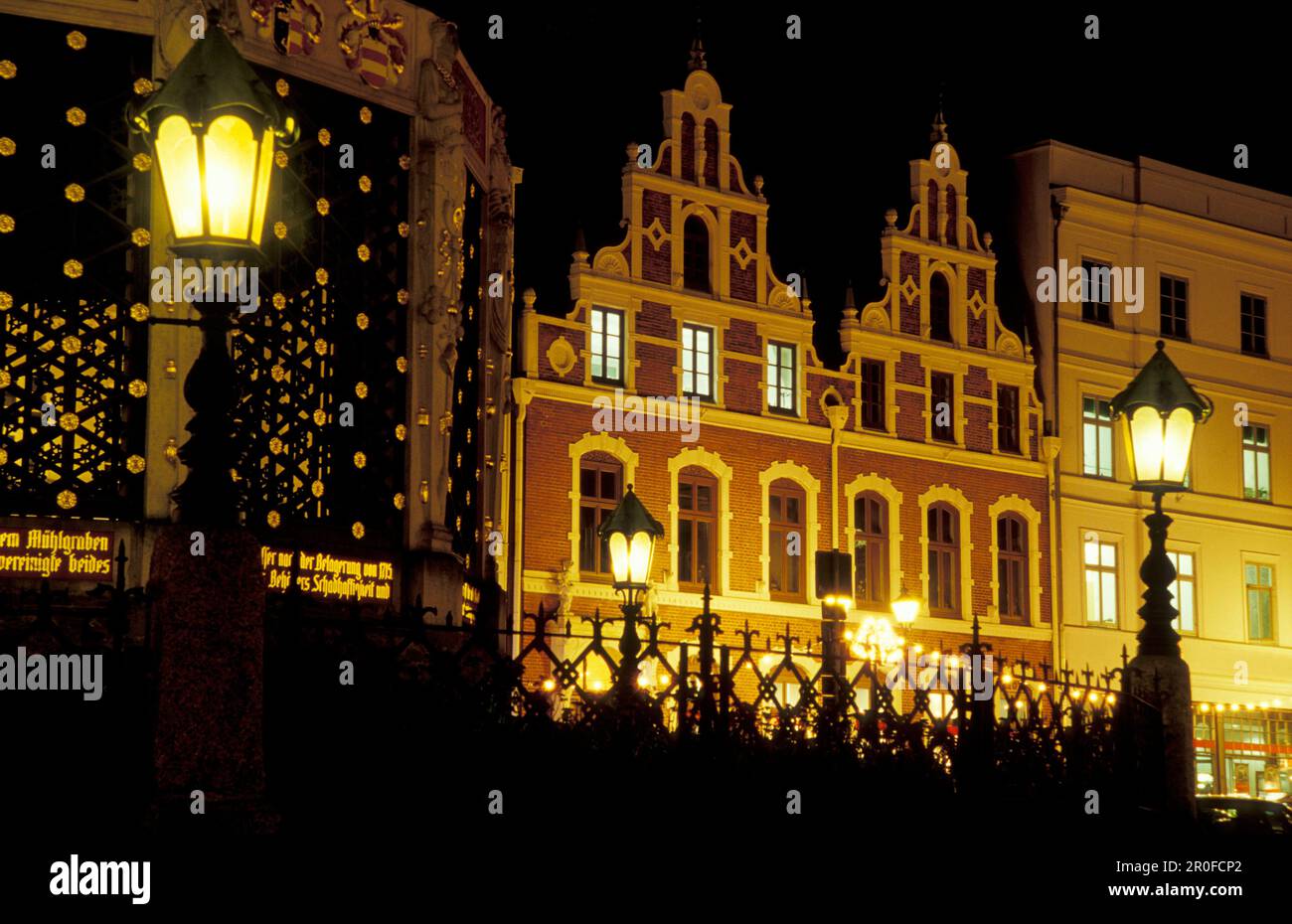 Wismar market square and Wasserkunst fountain at night, Mecklenburg ...