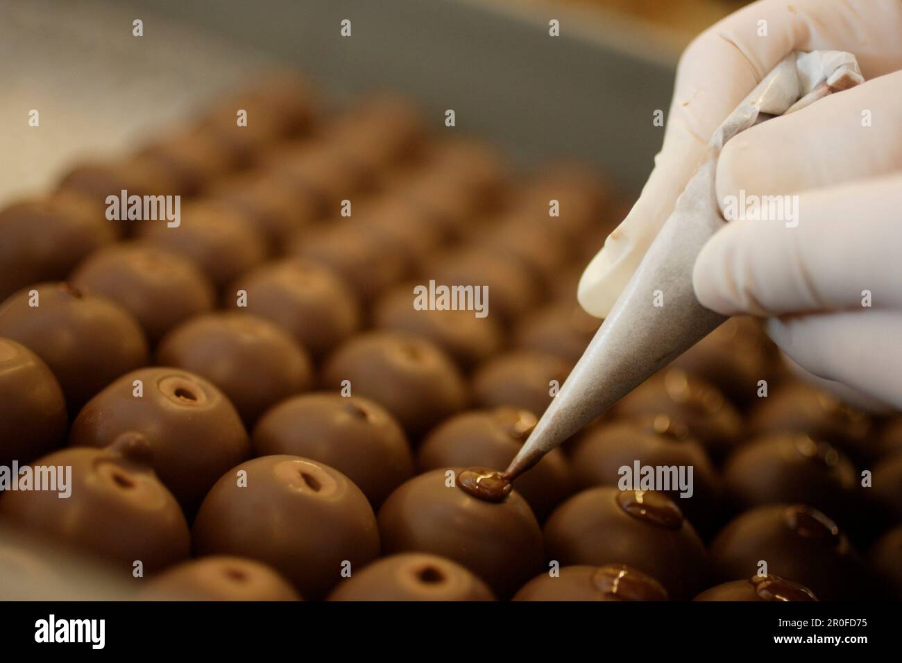Manufacture of the original Mozartkugeln, chocolate coated ...