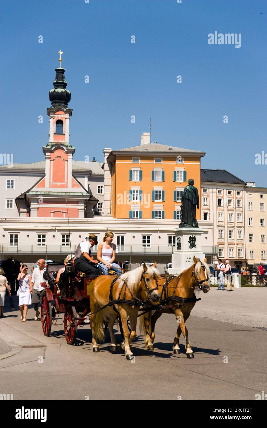 Cap passing Mozart Square with Mozart monument, Salzburg, Salzburg ...
