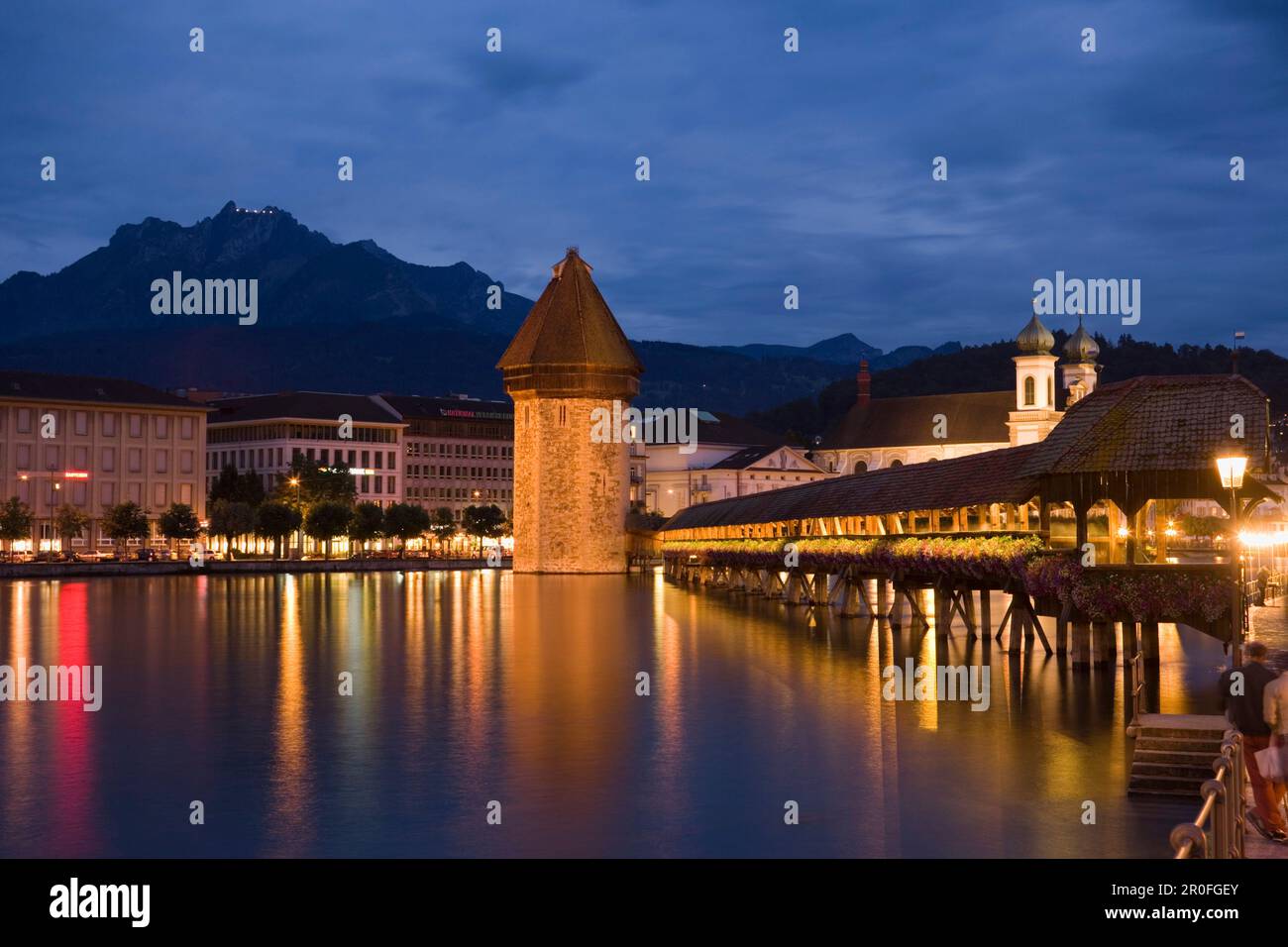 View over the river Reuss with illuminated chapel bridge, the oldest ...