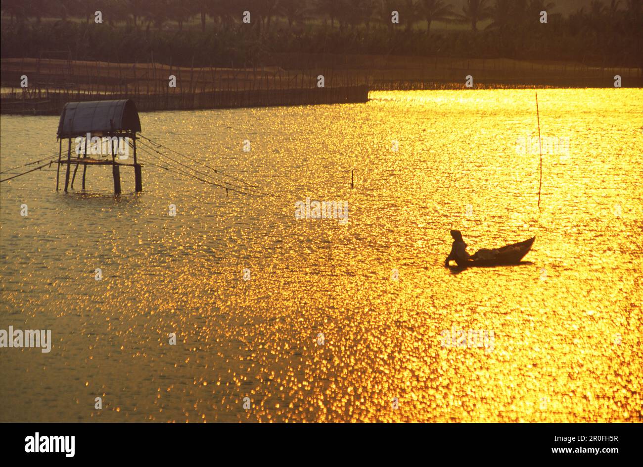 Fishing boats at sunset, Nha Thrang, Vietnam Stock Photo - Alamy