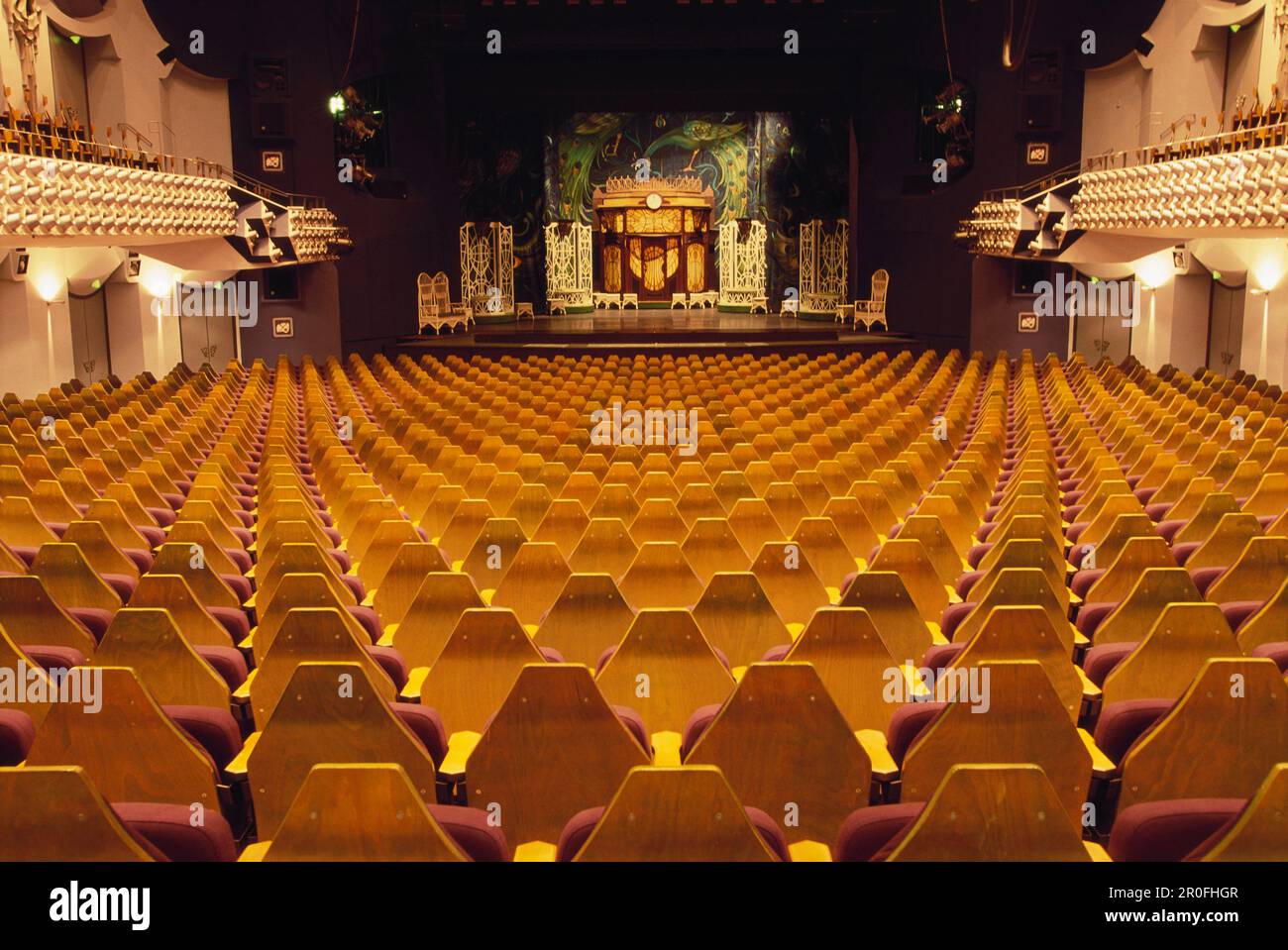Rows of seats and stage in a theater, Deutsches Theater, Munich ...