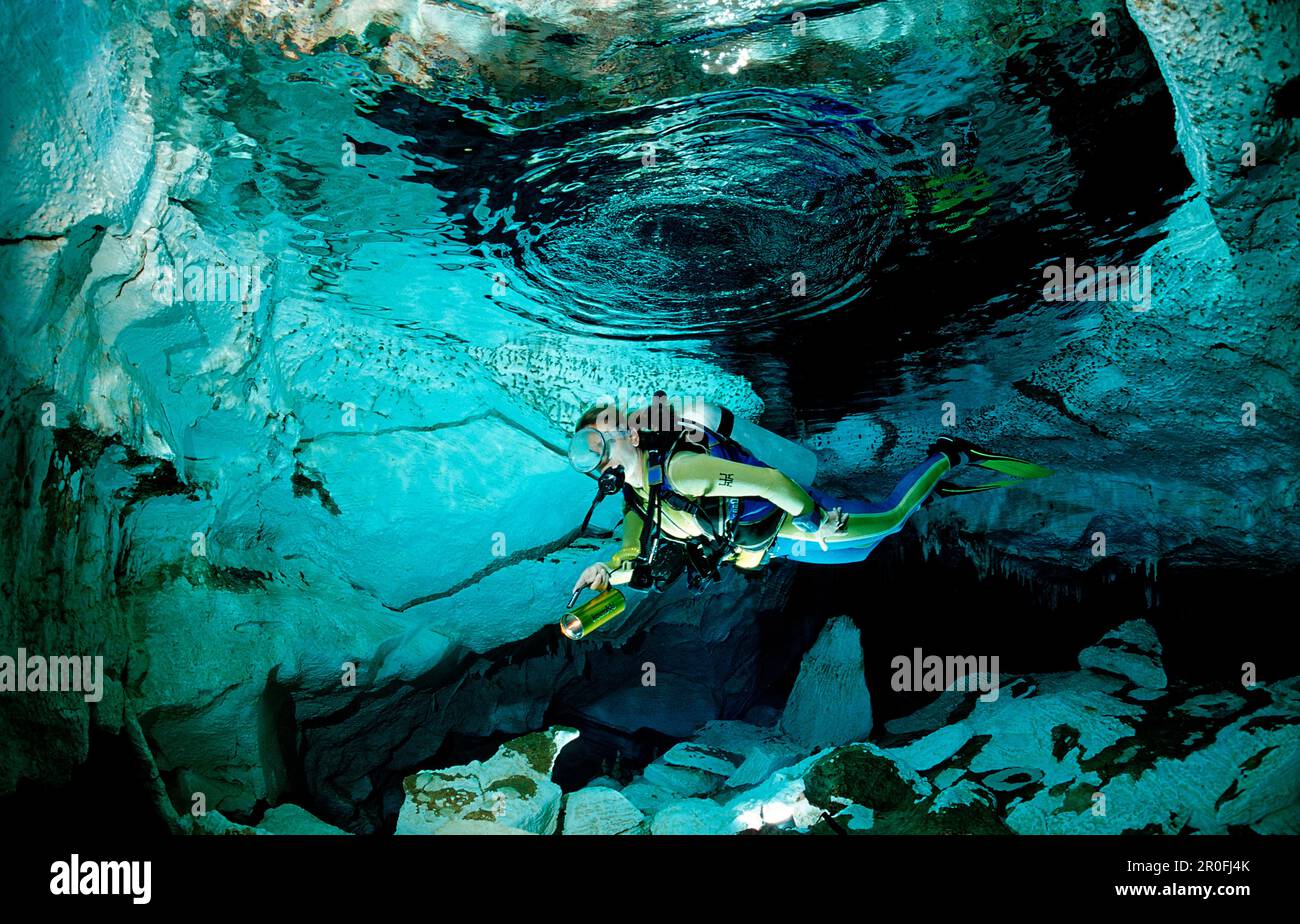 Scuba diver in underwater cave Cueva Taina, Punta Cana, Freshwater ...